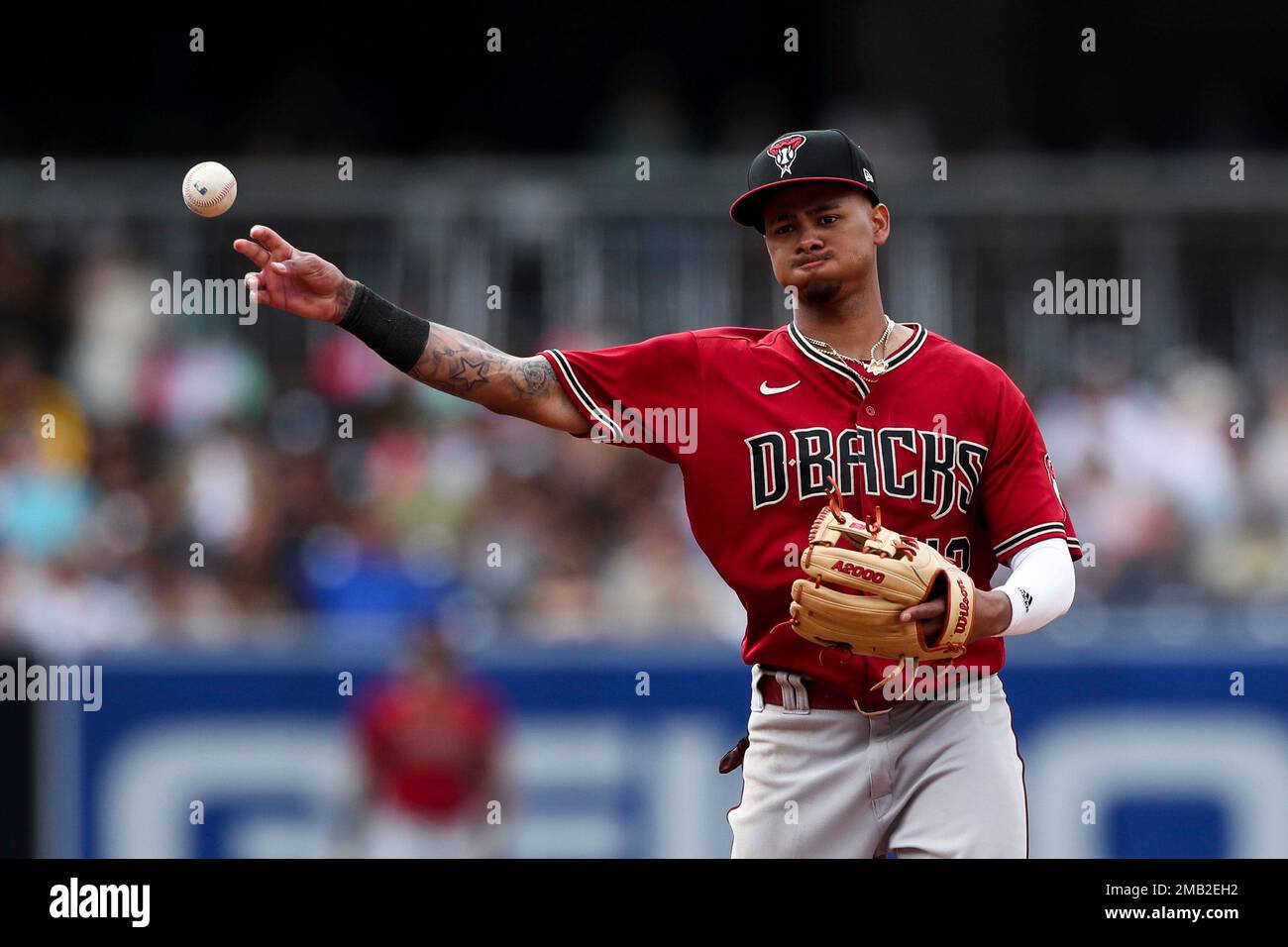 Arizona Diamondbacks second baseman Sergio Alcantara throws to first ...