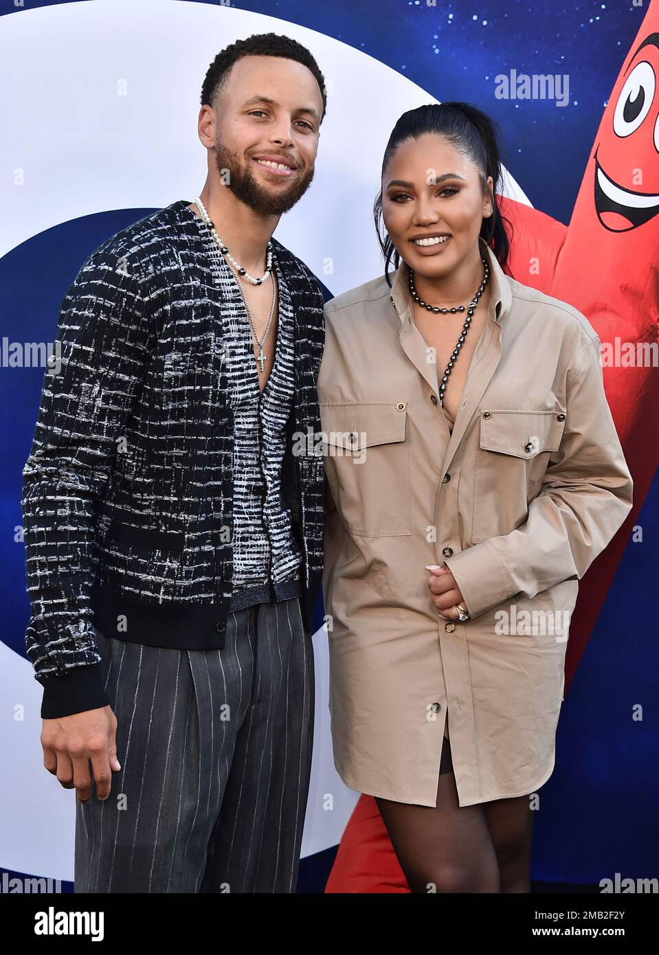 Stephen Curry, left, and Ayesha Curry arrive at the Los Angeles ...