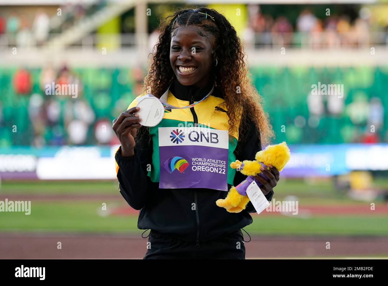 Silver medalist Shericka Jackson, of Jamaica, on the podium after the ...