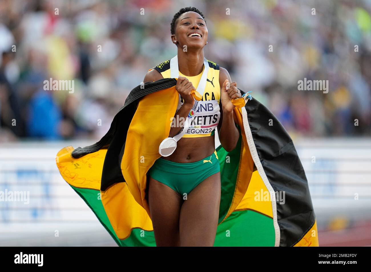 Silver medalist Shanieka Ricketts, of Jamaica, celebrates after the ...