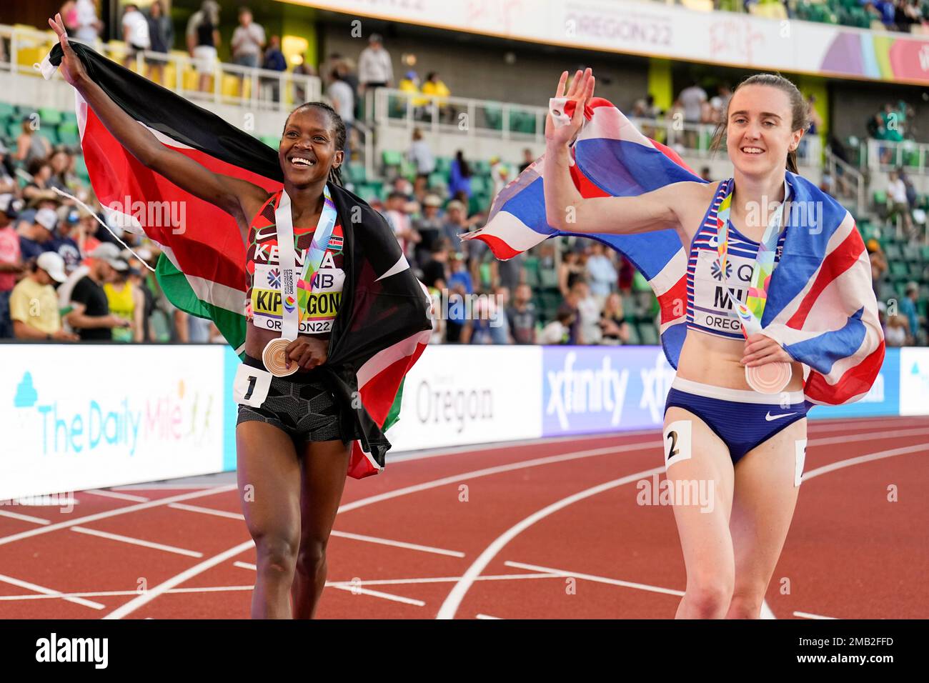 Gold medalist Faith Kipyegon, of Kenya, left, and bronze medalist Laura ...