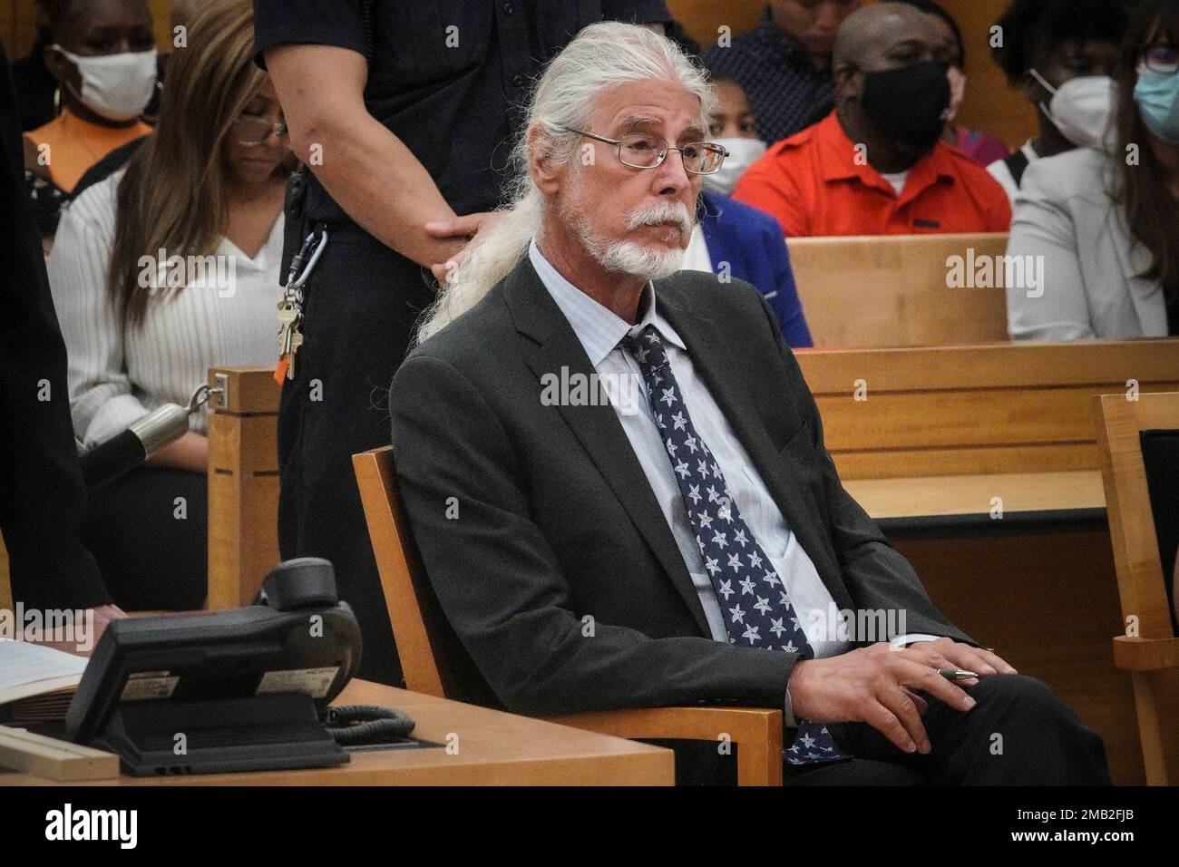 Attorney Ron Kuby listens during the exoneration hearing for his ...