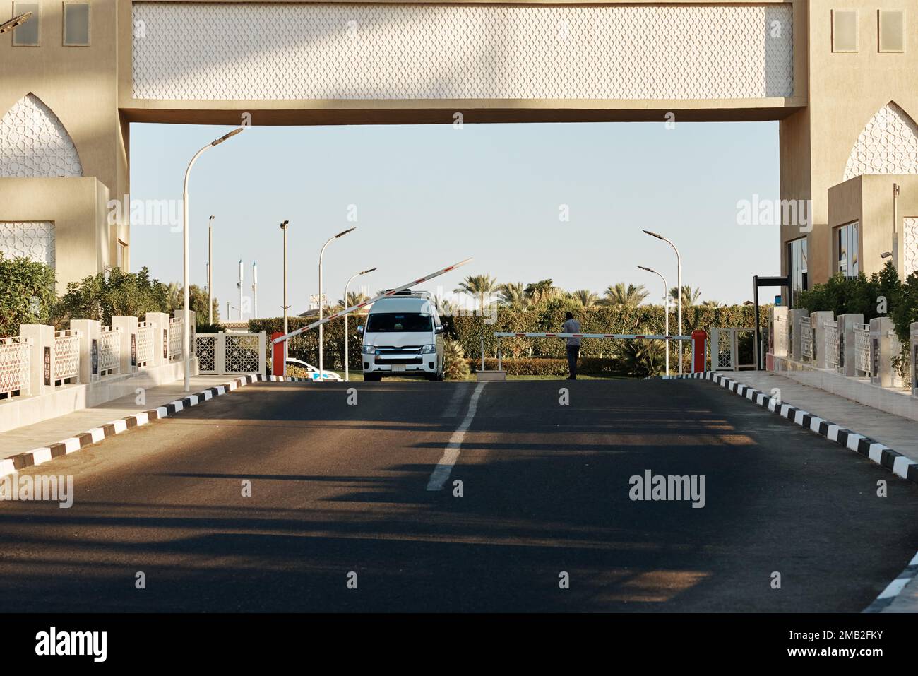 Checkpoint with security and automatic barrier on street. Guarded ...