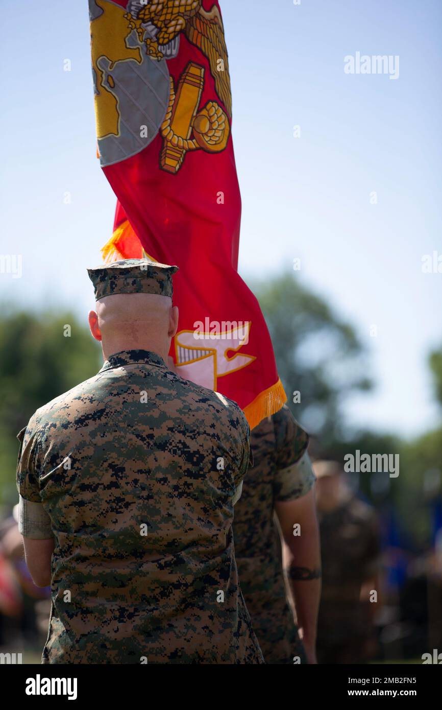 U.S. Marine Corps Lt. Col. Erik C. Quist, right, outgoing commanding ...