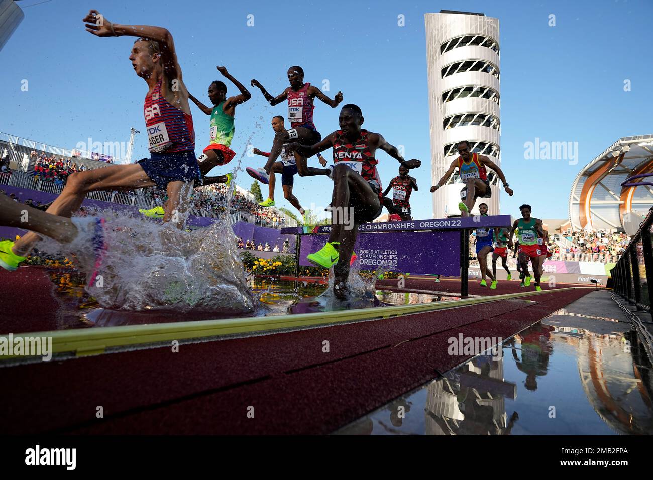 Runners compete during the men's 3000-meter steeplechase final at the ...
