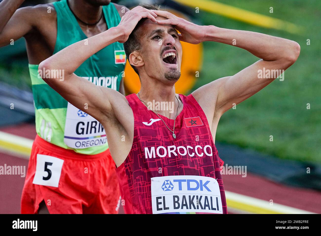 Soufiane El Bakkali, of Morocco, reacts after winning the men's 3000 ...