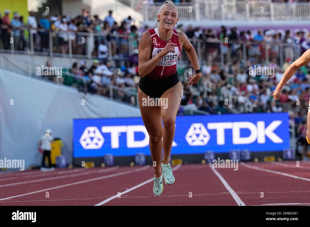 Ida Karstoft, of Denmark, competes in a heat in the women's 200-meter ...