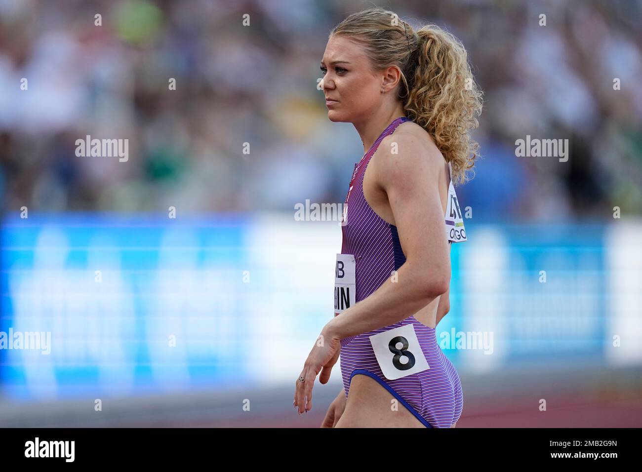 Beth Dobbin, of Britain, competes in a heat in the women's 200-meter ...