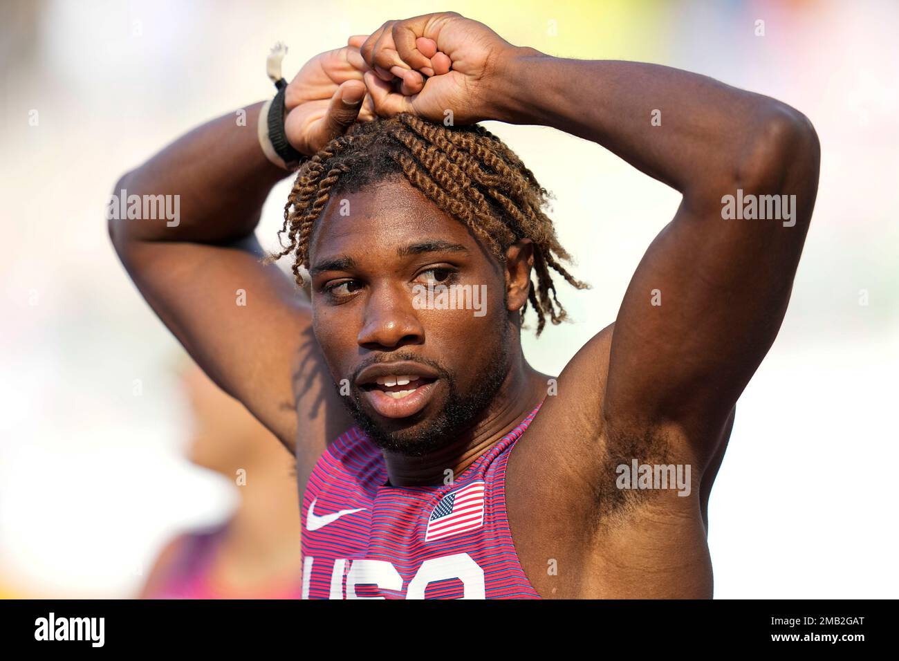 Noah Lyles, of the United States, wins a heat in the men's 200-meter ...