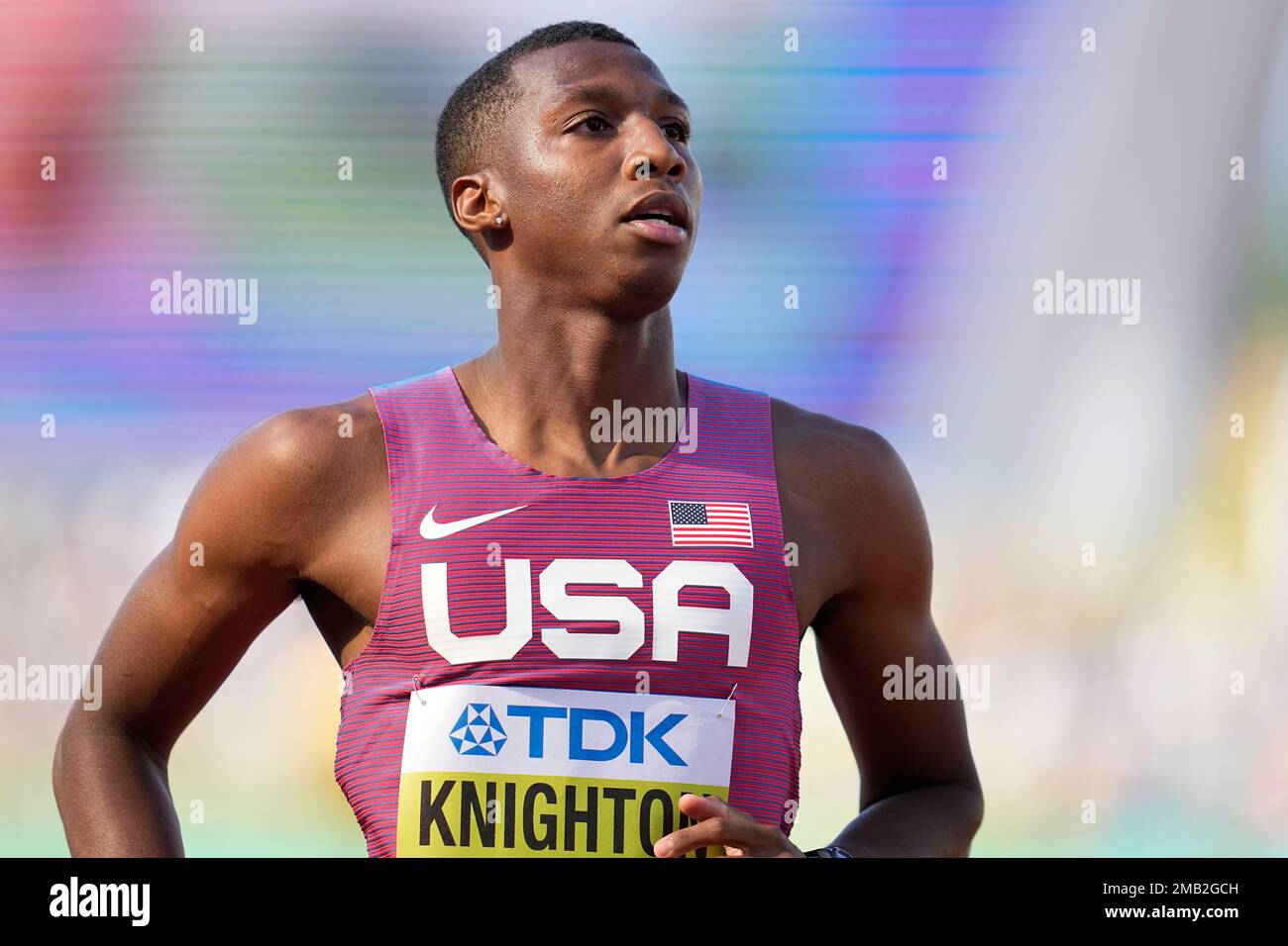 Erriyon Knighton, of the United States, wins a heat in the men's 200 ...