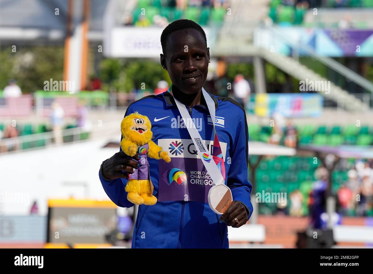 Bronze medalist Lonah Chemtai Salpeter, of Israel, poses during a medal ...