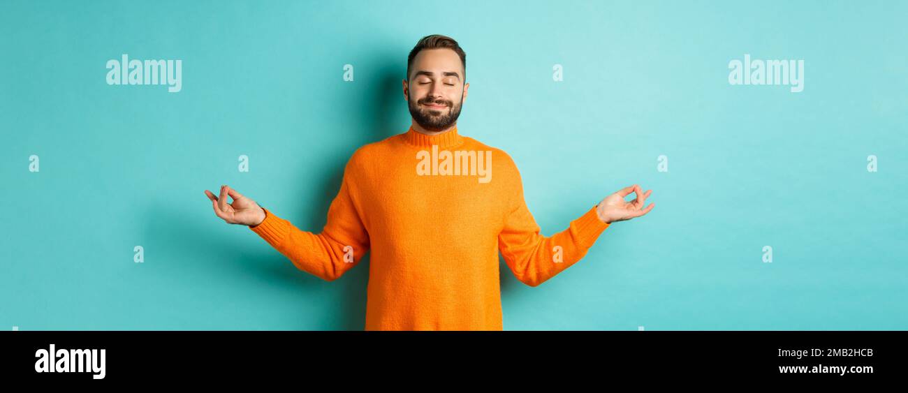 Image of relaxed and relieved man close eyes and smiling, feeling ...