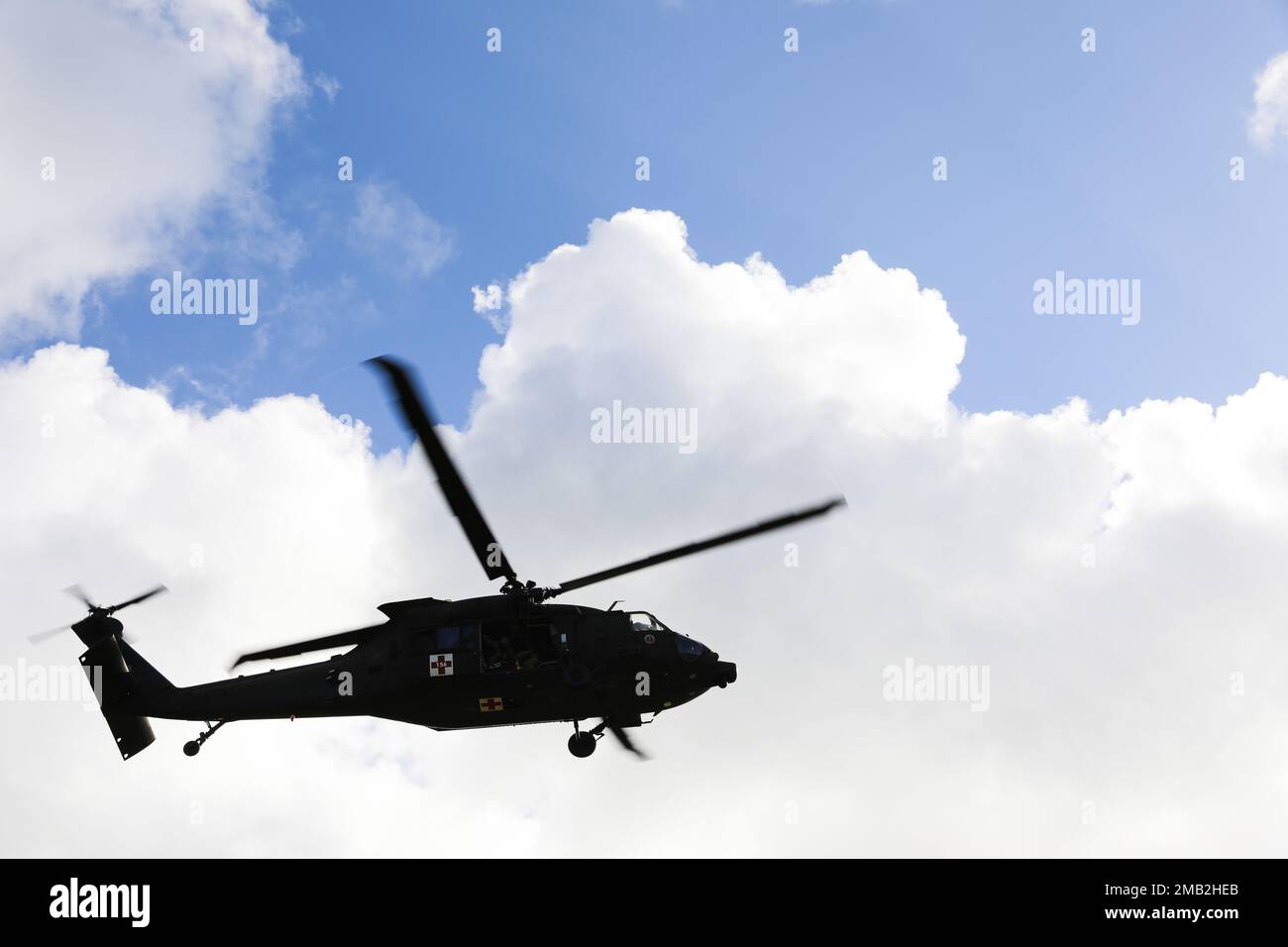 Hawaii Army National Guard (HIARNG) UH-60 Black Hawk helicopter flies ...