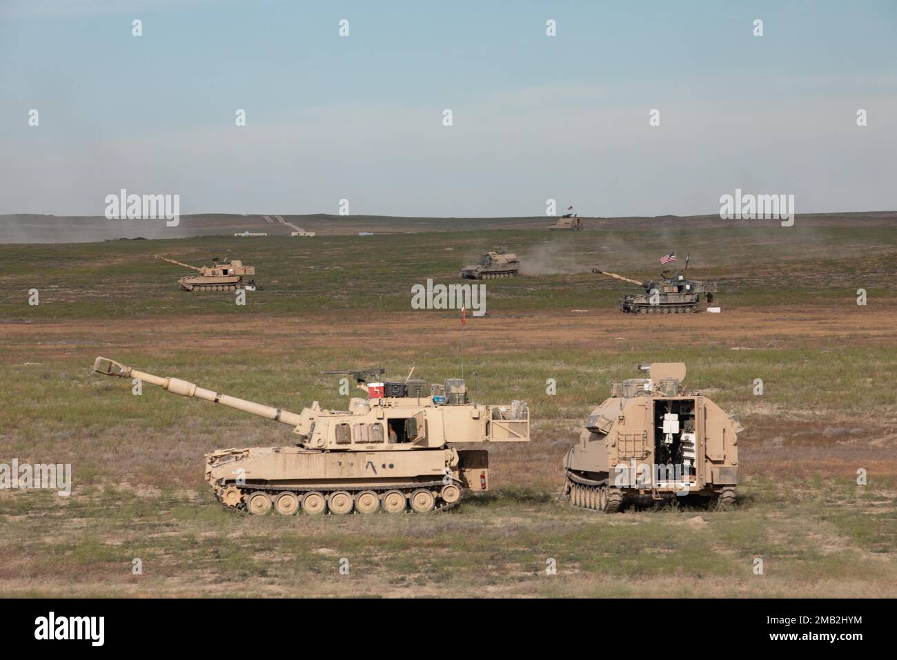 A gun crew from 1-145th Field Artillery Battalion, 65th Field Artillery Brigade, Utah National ...