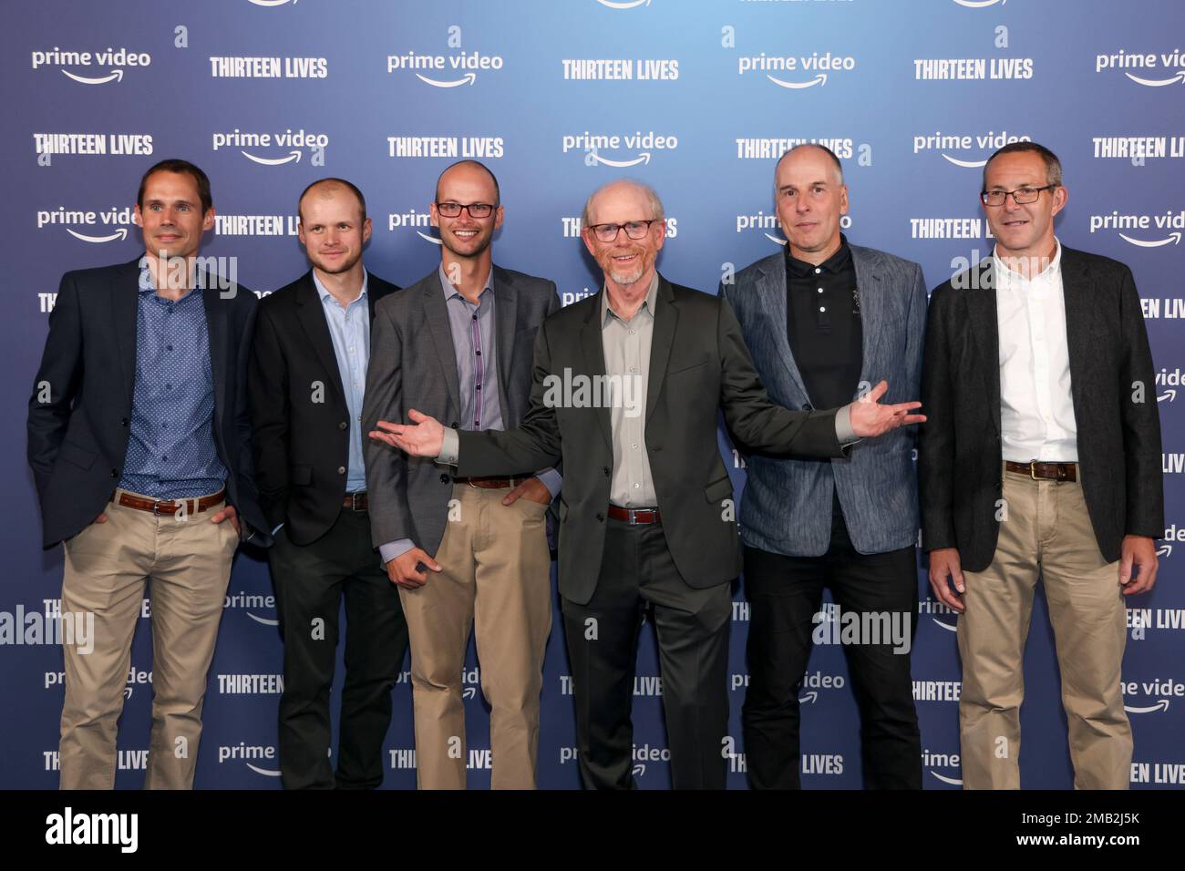 Director Ron Howard, centre, poses with divers Chris Jewell, from left ...