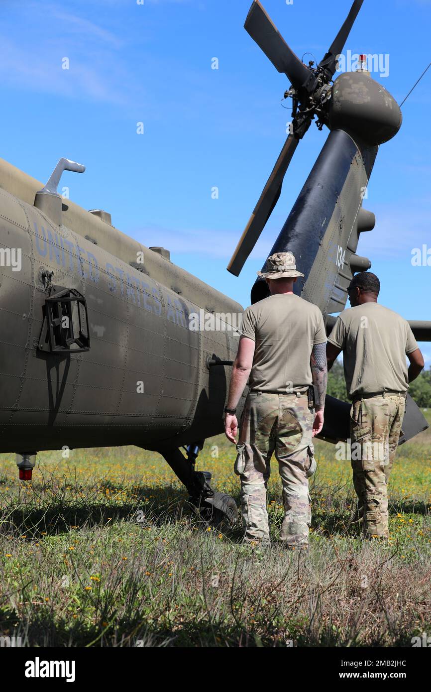 Hawaii Army National Guard (HIARNG) Sgt. Matthew Roberts, a helicopter ...