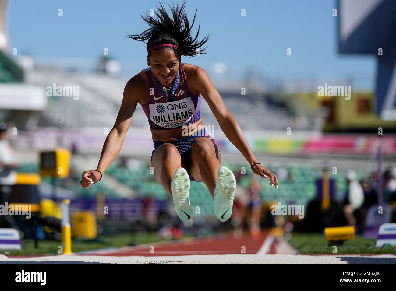 Kendell Williams, of the United States, competes in the long jump ...