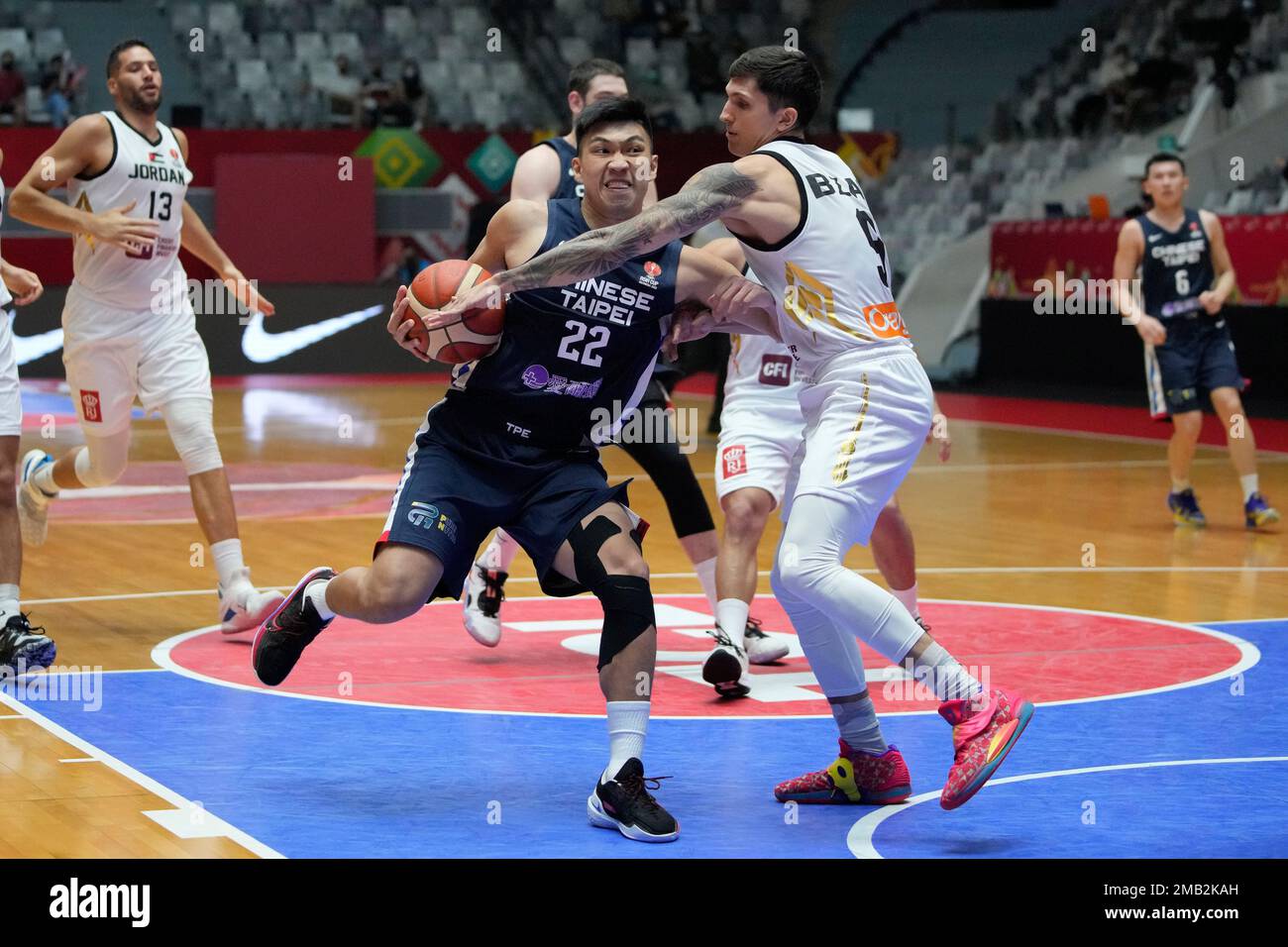 Taiwan's Huang Hung Han, left, plays against Jordan's Sami Bzai during ...