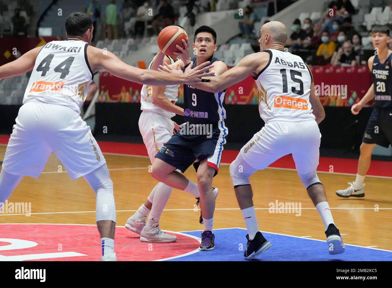 Taiwan's Chen Ying Chun, center, plays against Jordan's Ahmad Al Dwairi ...