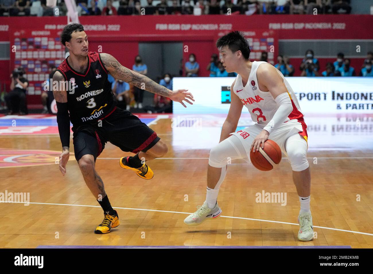 China's Zhao Rui, right, plays against Indonesia's Brandon Dorn Jawato ...