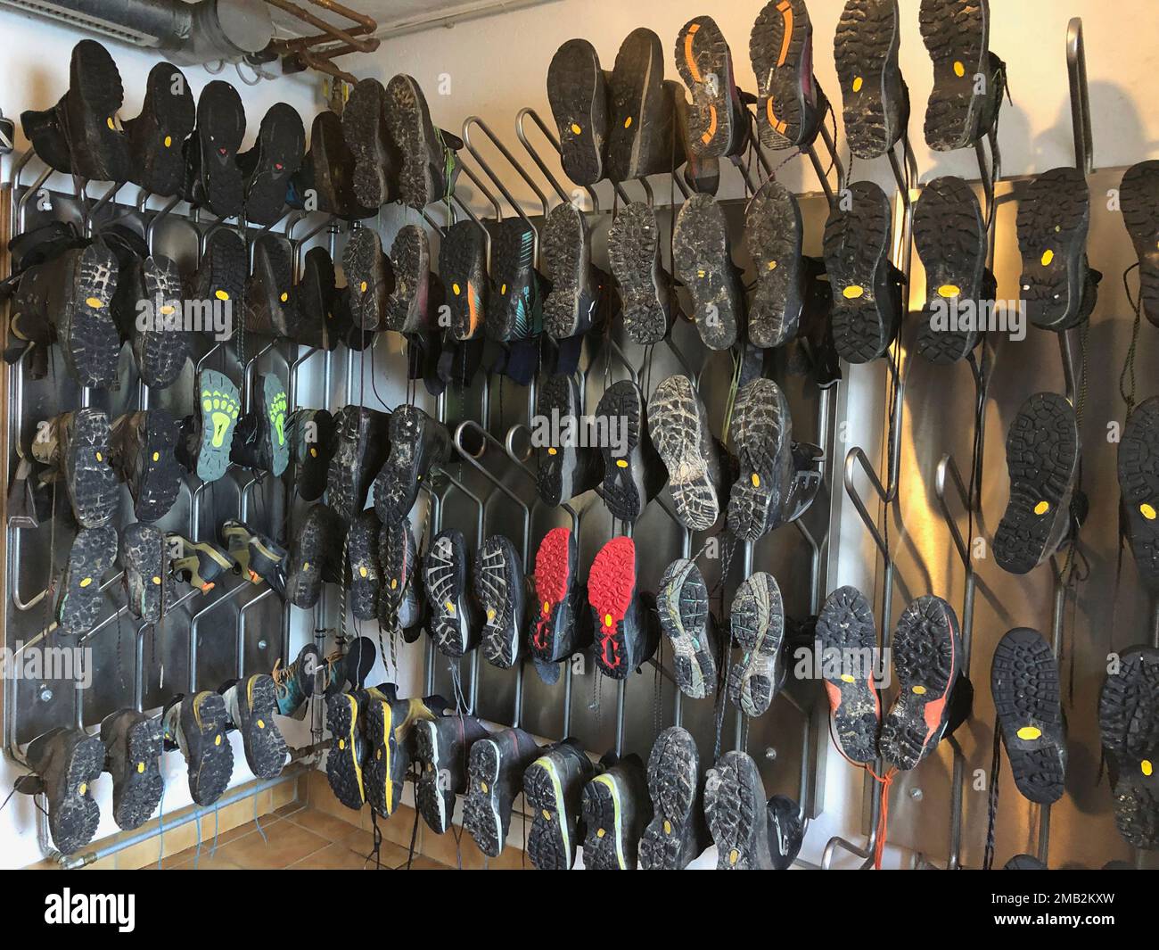 Hiking boots are displayed in a drying room, in a hut in Berchtesgaden ...