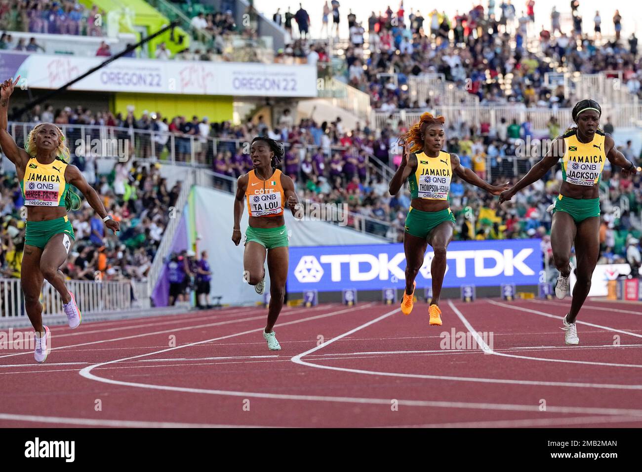 Shelly-Ann Fraser-Pryce, of Jamaica, wins the final in the women's 100-meter run as Elaine ...