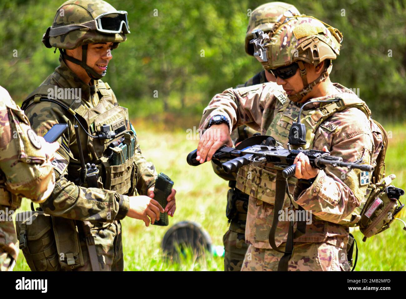 Polish soldiers with the 4th Chemical Regiment show U.S. Soldiers with ...