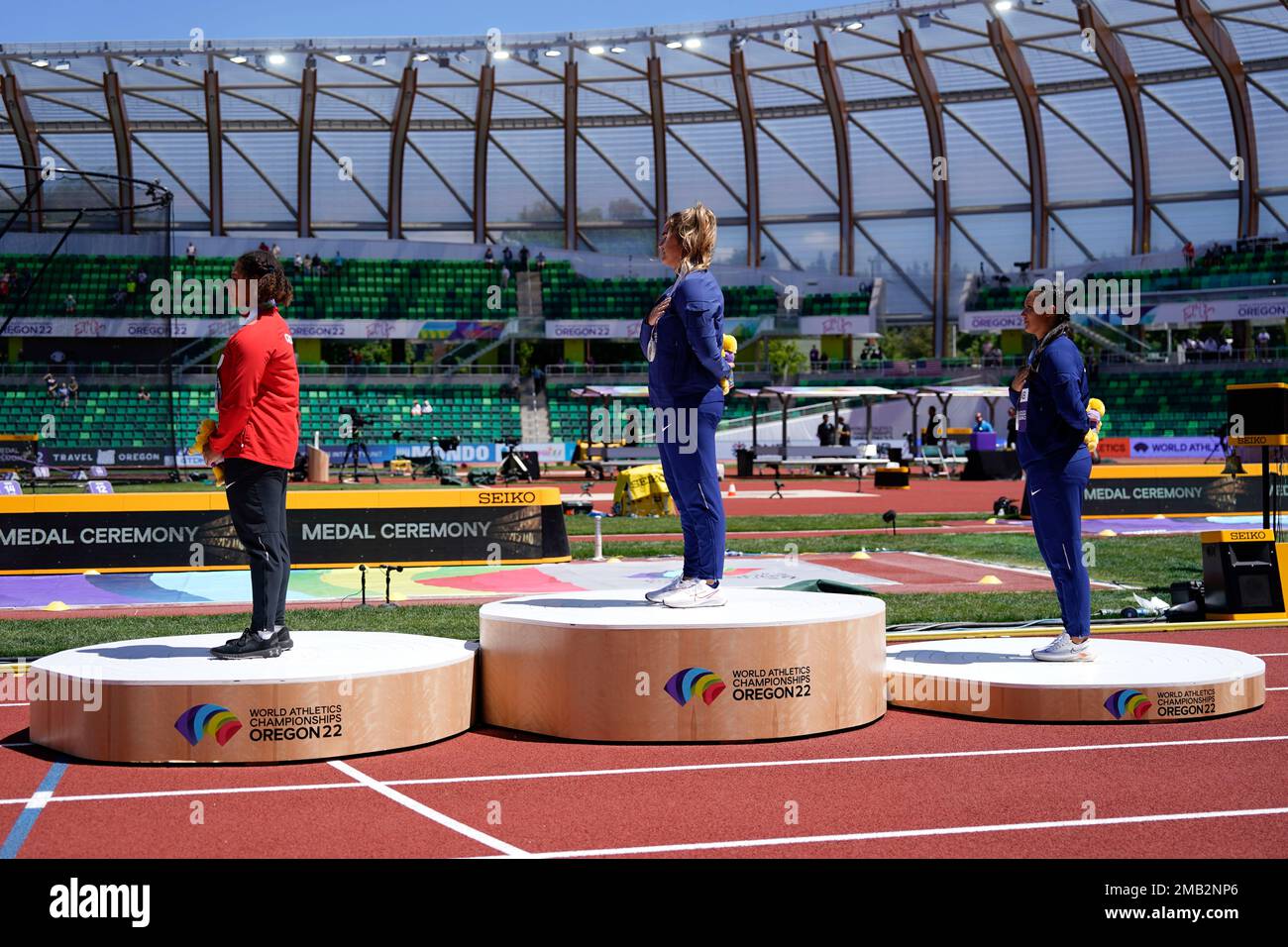 Gold medalist Brooke Andersen, of the United States, center, stands ...