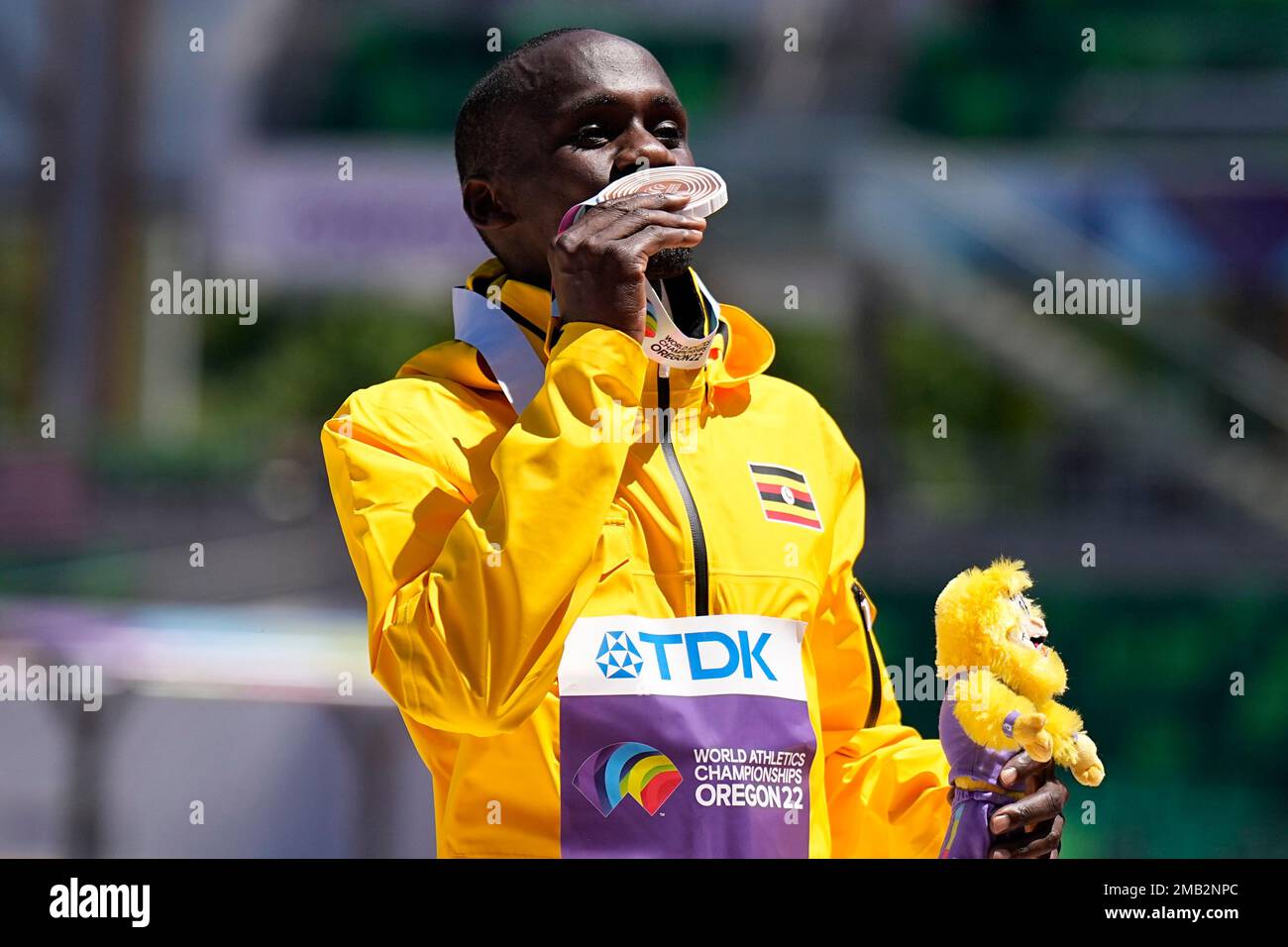 Bronze medalist Jacob Kiplimo, of Uganda, stands on the podium during a ...