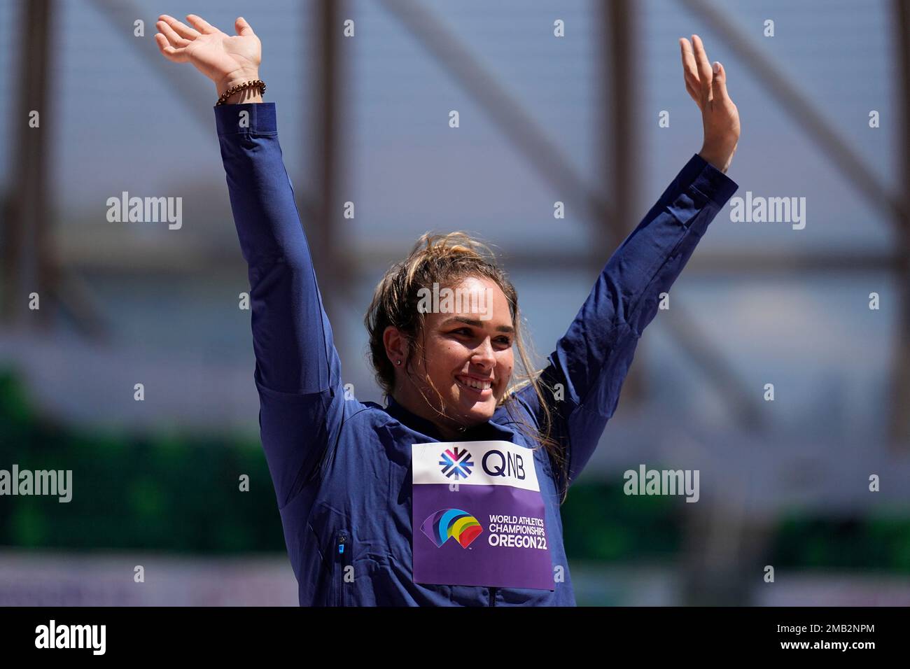 Gold medalist Brooke Andersen, of the United States stands on the ...