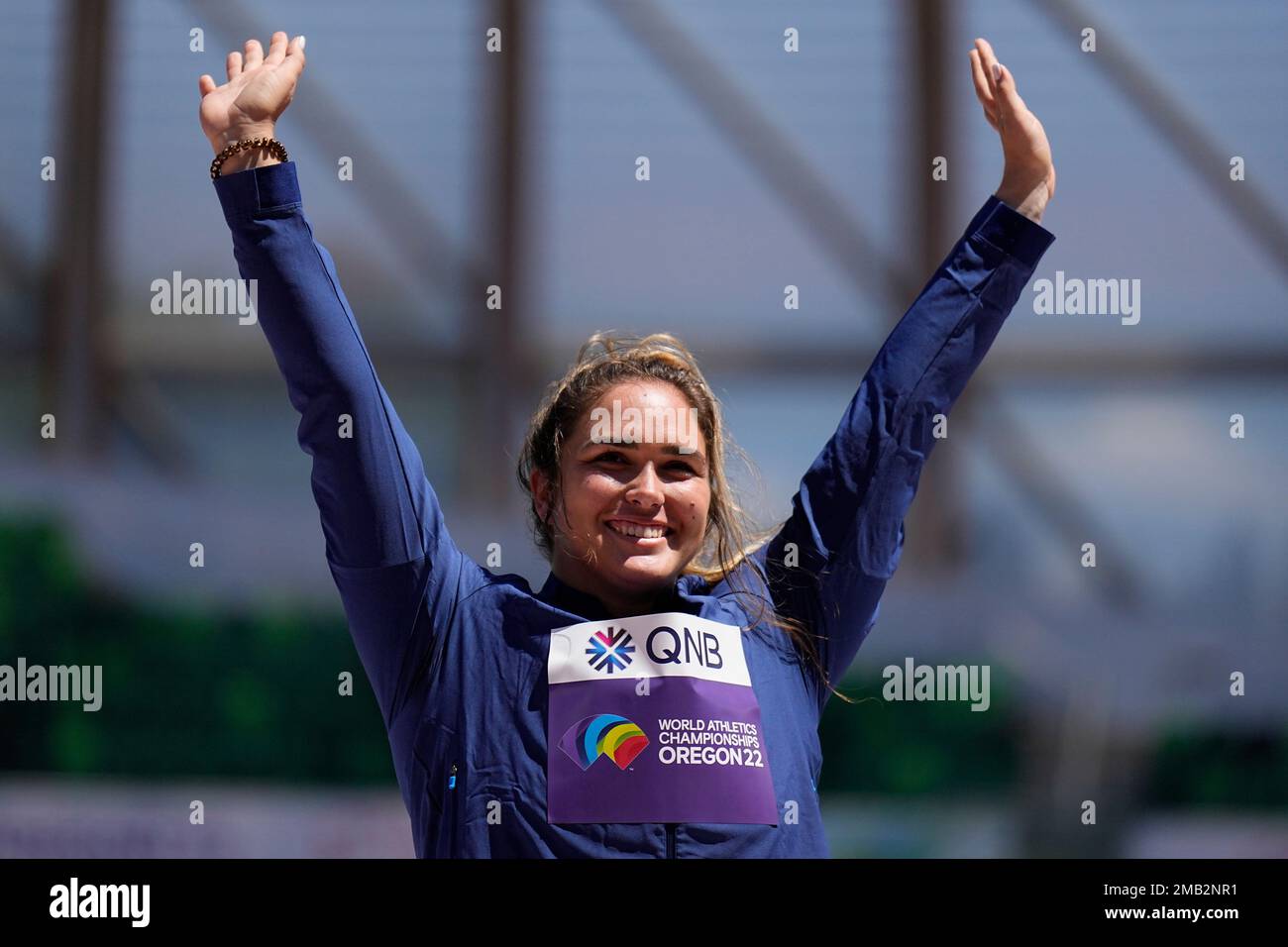 Gold medalist Brooke Andersen, of the United States stands on the ...