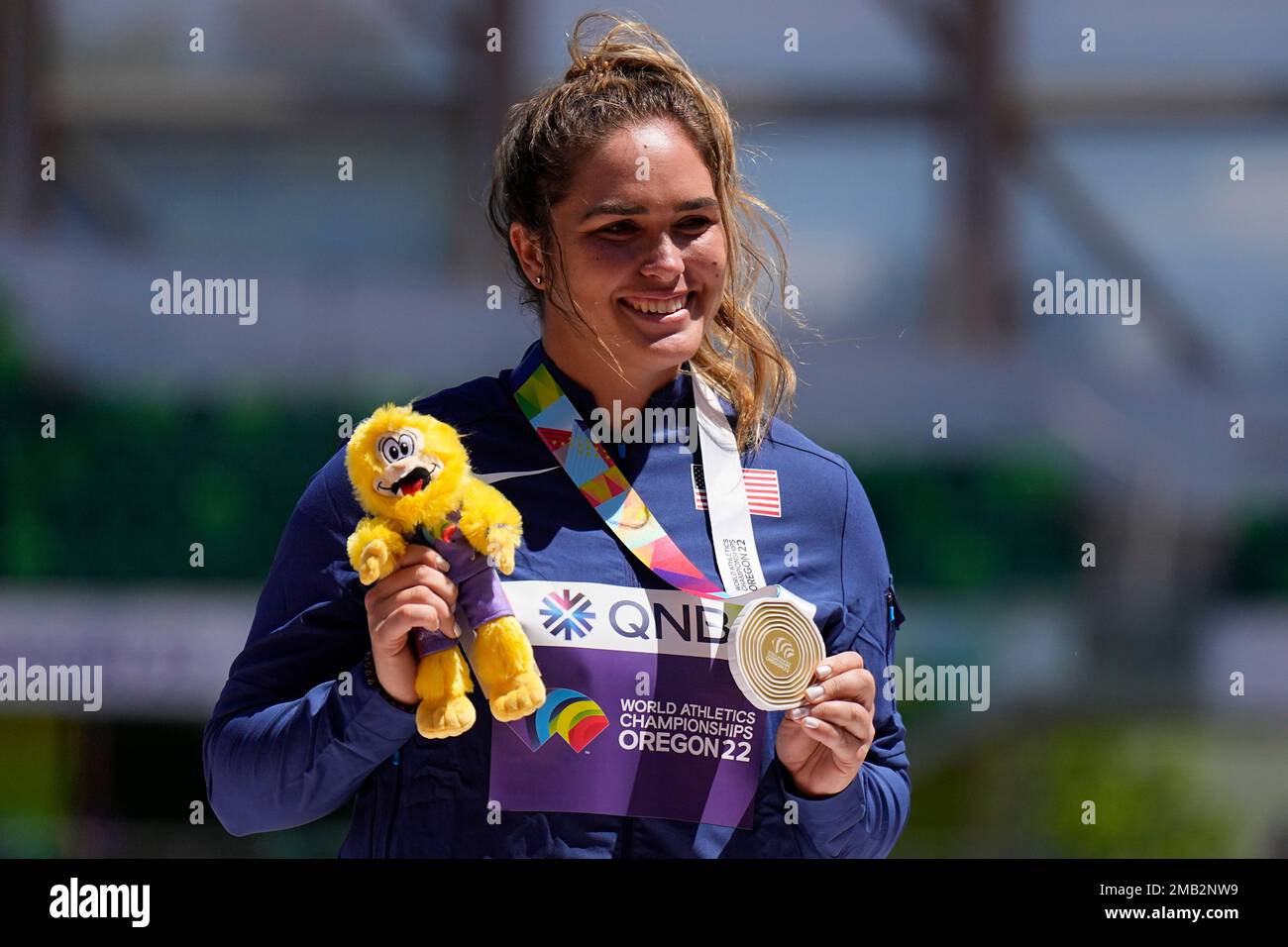 Gold medalist Brooke Andersen, of the United States stands on the ...