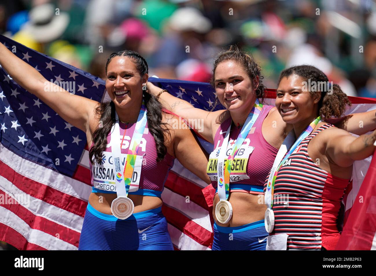 Gold medalist Brooke Andersen, of the United States, center, stands ...