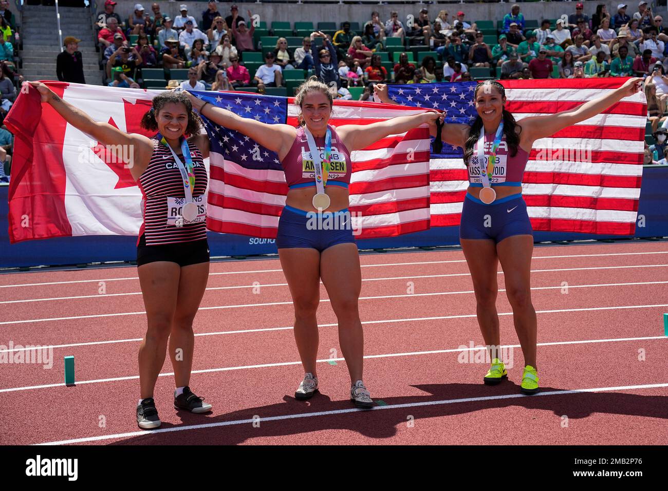 Gold medalist Brooke Andersen, of the United States, center, stands ...