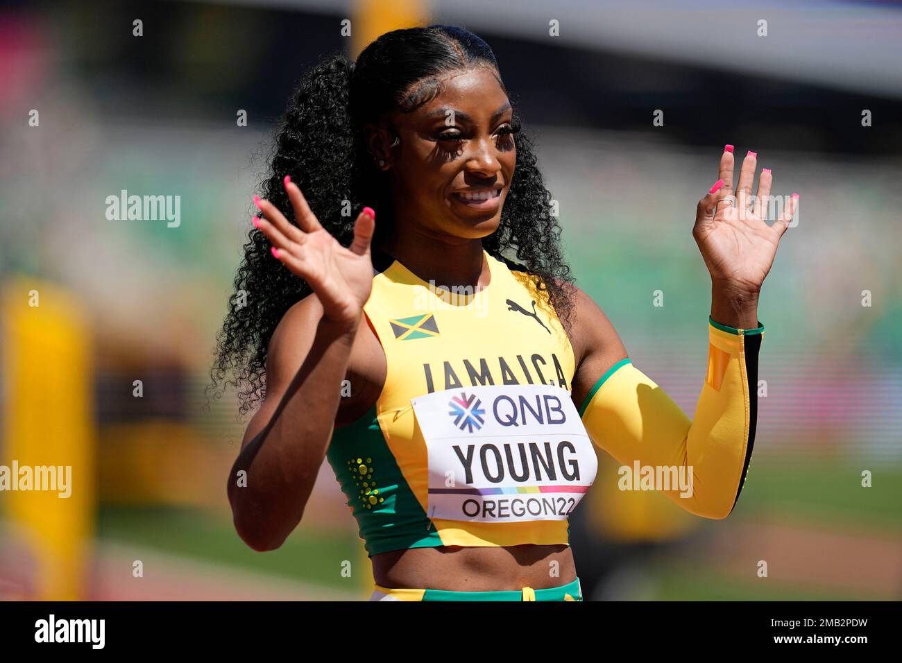 Charokee Young, of Jamaica, prepares for a heat in the women's 400 ...