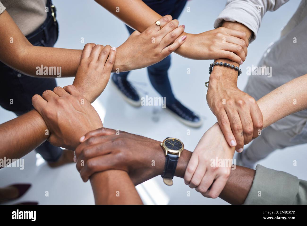 Hands one above the other hi-res stock photography and images - Alamy