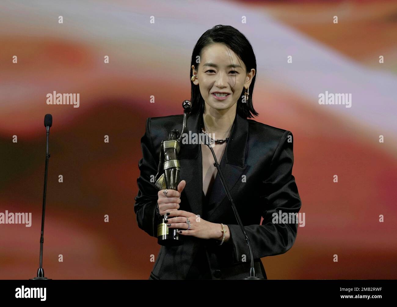 Chinese actress Cya Liu speaks after winning the Best Actress award for the movie "LIMBO" at the ...
