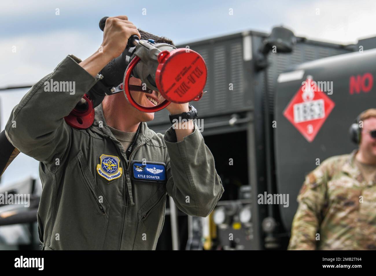 Maj. Kyle Schafer, 22nd Operations Group KC-46A Pegasus pilot, carries ...