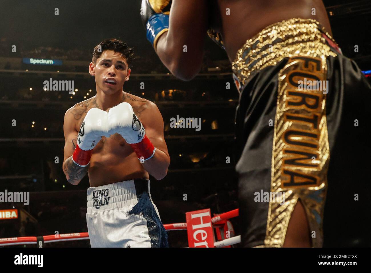 Ryan Garcia, left, and Javier Fortuna exchange punches during a ...