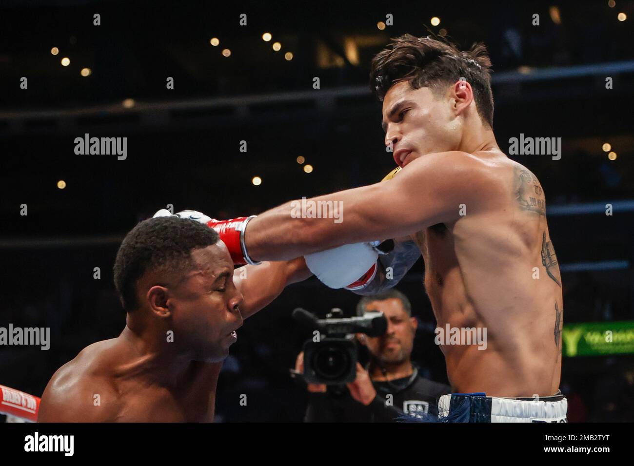 Ryan Garcia, right, and Javier Fortuna exchange punches during a ...