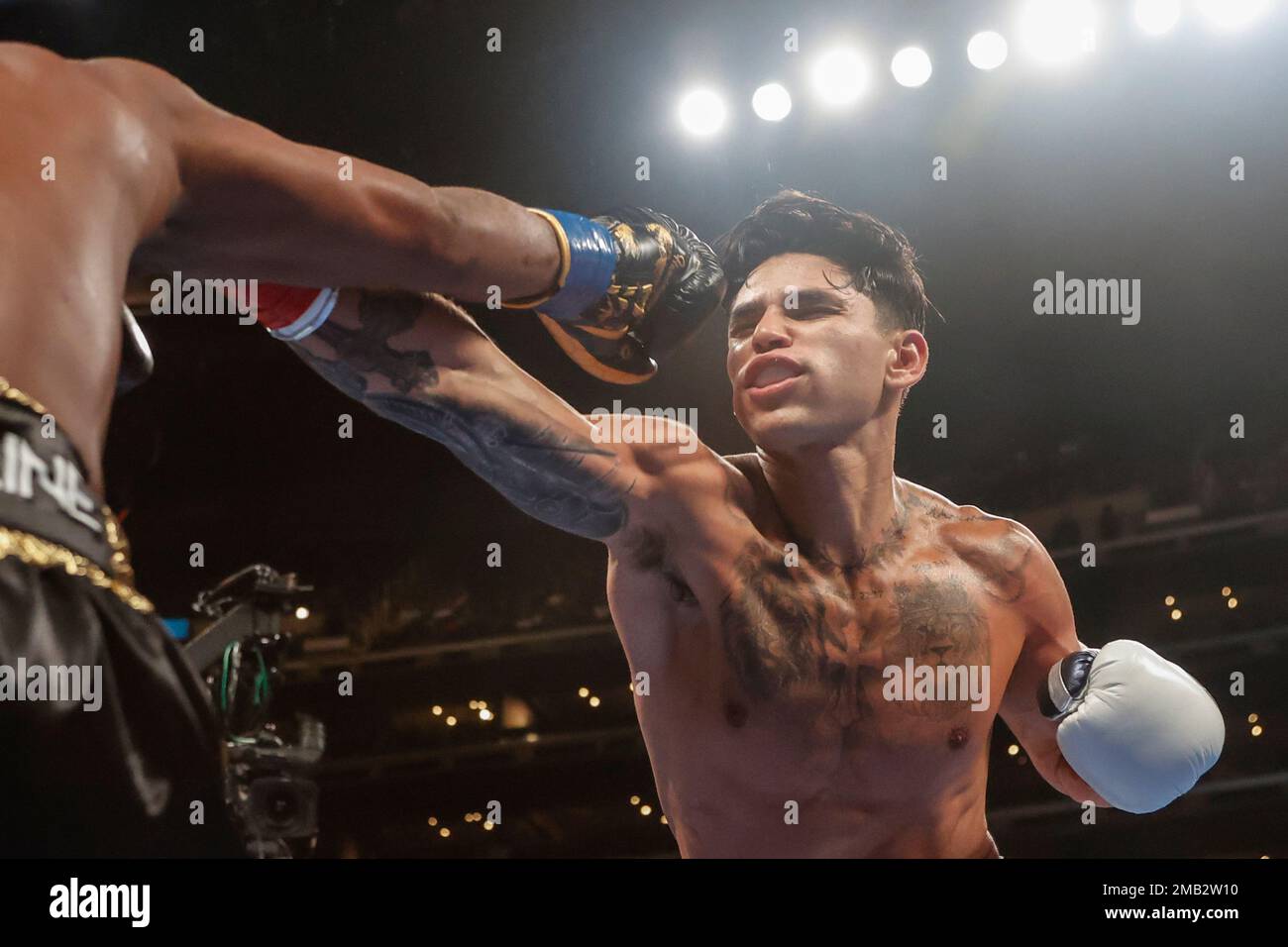 Ryan Garcia, right, and Javier Fortuna exchange punches during a ...