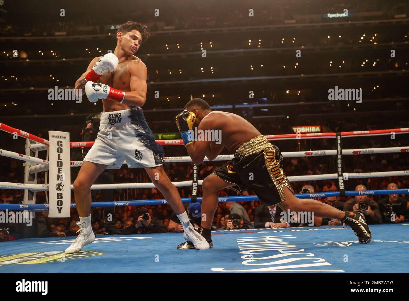 Ryan Garcia, left, and Javier Fortuna exchange punches during a ...
