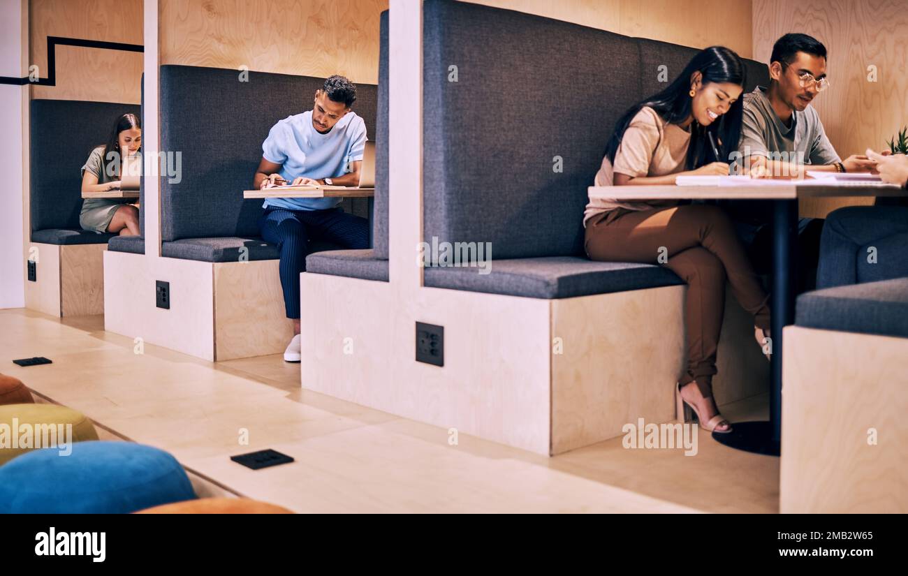 An inspiring space to work in. creatives working in cubicles Stock ...