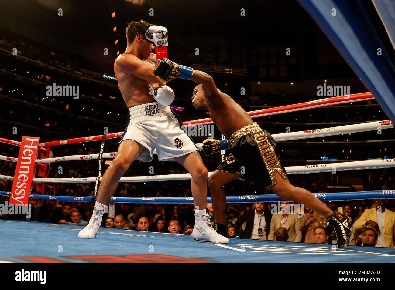 Javier Fortuna, right, tries to hit Ryan Garcia during a lightweight ...