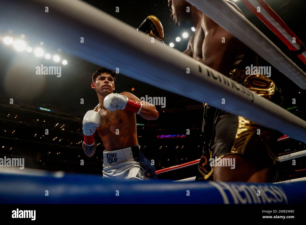 Ryan Garcia, left, and Javier Fortuna exchange punches during a 12 ...