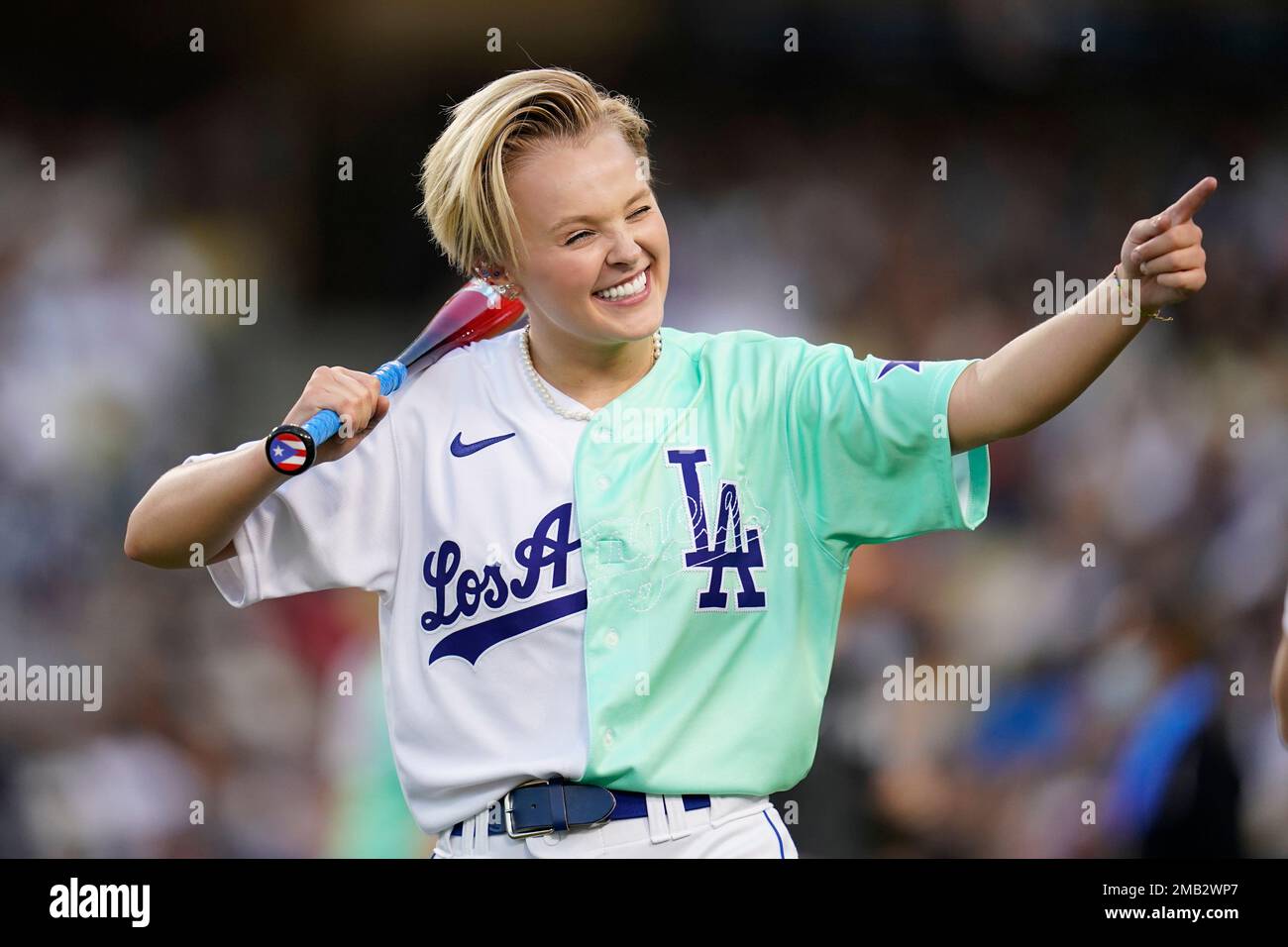 Jojo Siwa gestures on the field during the MLB All Star Celebrity ...