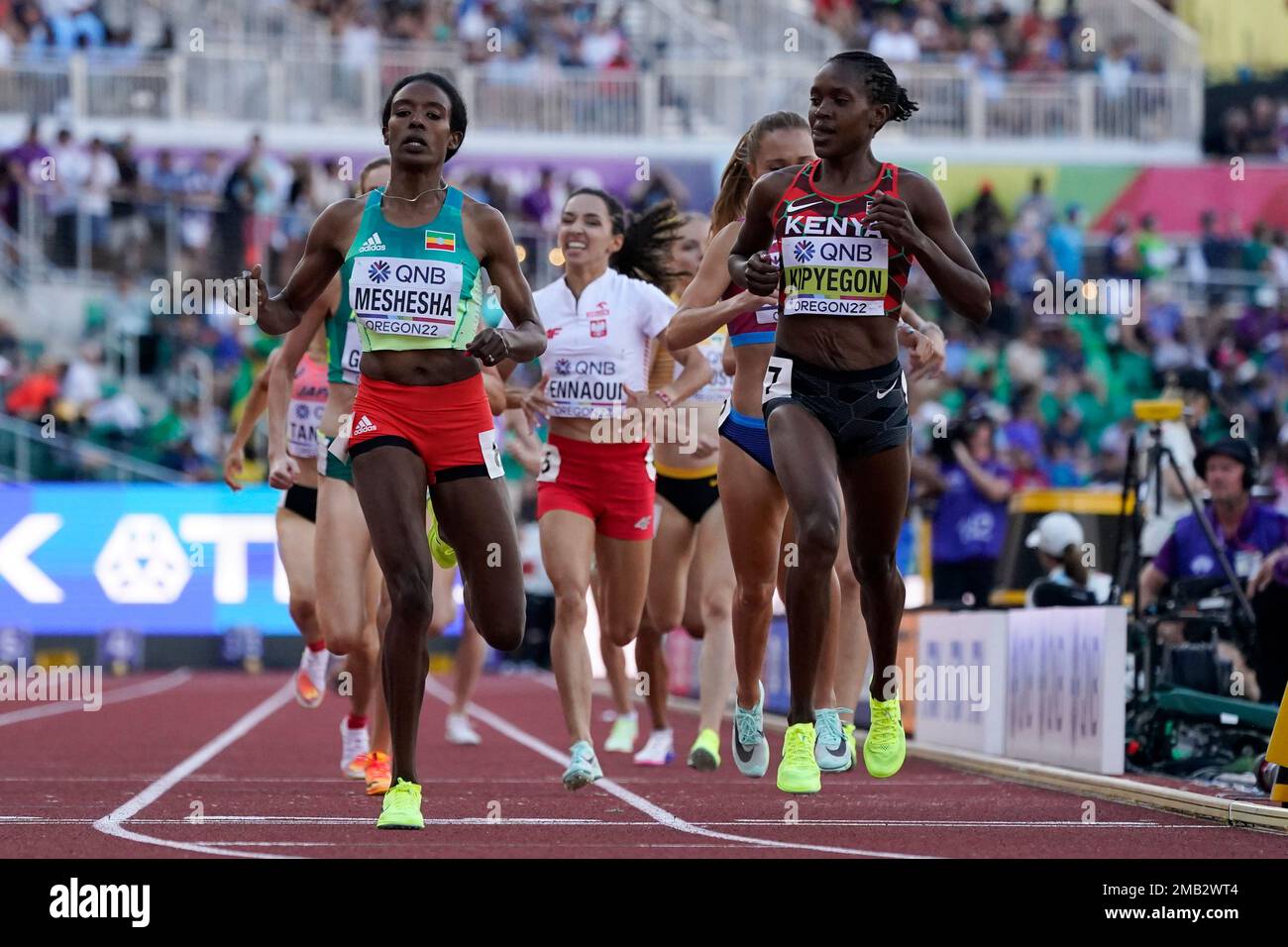Faith Kipyegon, of Kenya, wins the women's 1500-meter run semifinal at ...