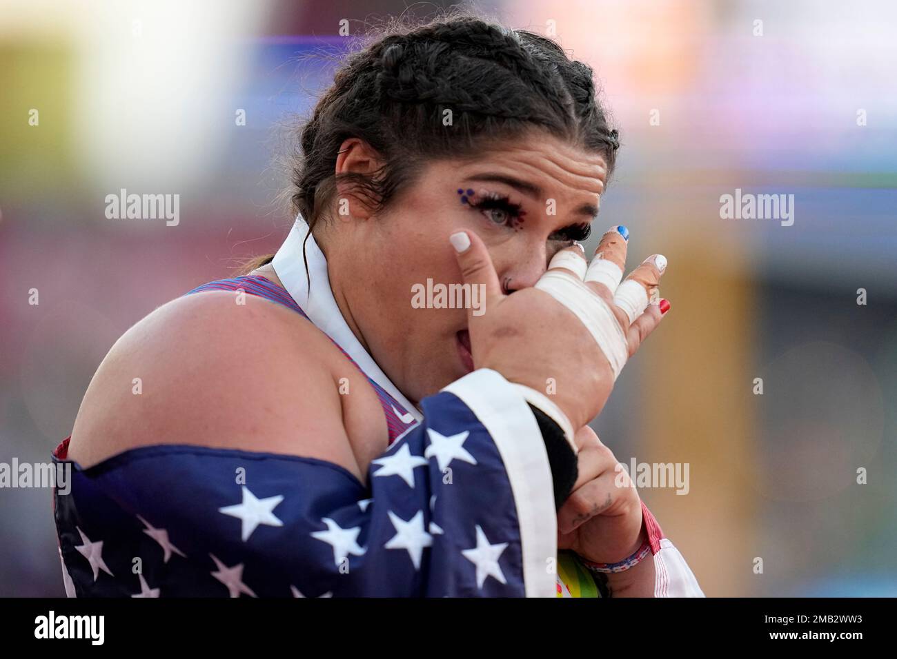 Chase Ealey, of the United States, wipes a tear away after wining the ...