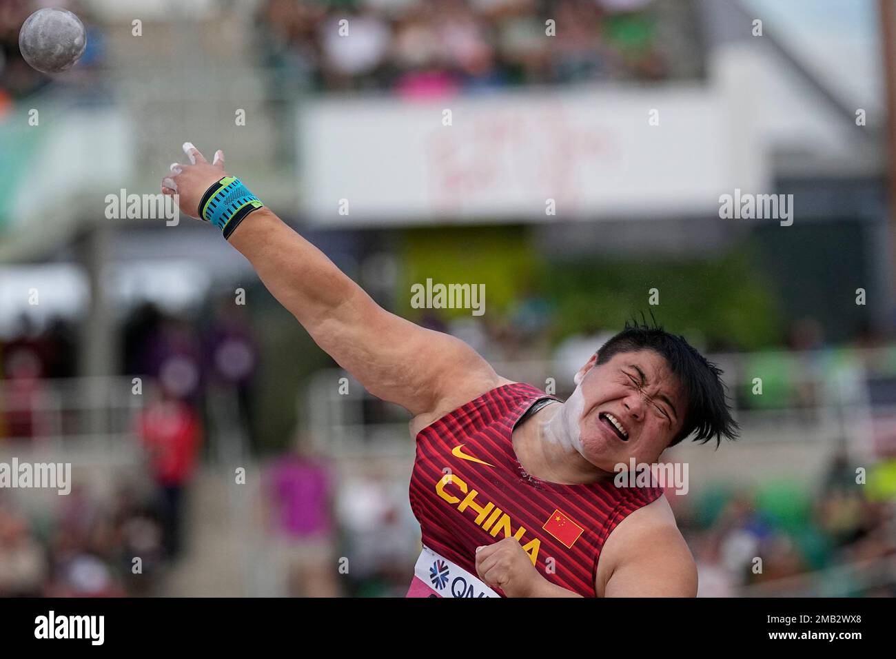 Lijiao Gong, of China, competes during the women's shot put final at ...