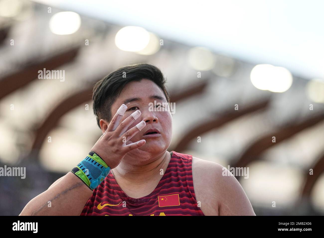 Lijiao Gong, of China, competes during the women's shot put final at ...
